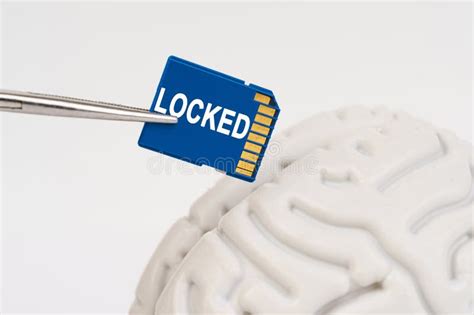 A Man Inserts A Memory Card Into His Brain With The Inscription Locked Stock Image Image Of