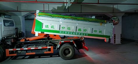 海口西秀镇试点移动式建筑垃圾箱进小区 小绿车”上门收运避免乱倾倒手机新浪网