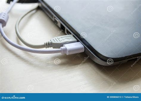 Laptop With Usb Type C Adapter With Pluged Usb Cables And Sd Card The Usb Adapter Under The