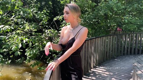 The Girl Topless Is Walking In The Park In Public