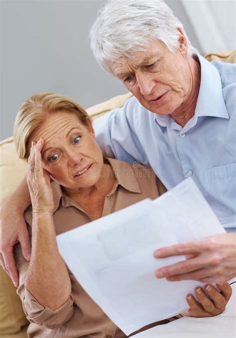 I Need My Glasses Im Seeing Double A Unhappy Senior Couple Looking At