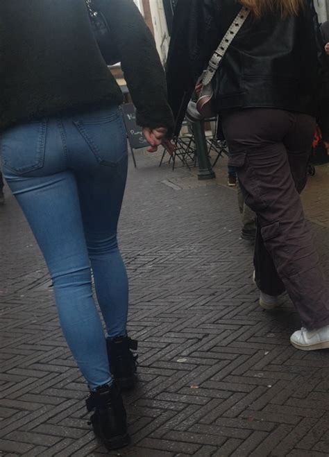 Sexy Blond With A Little Tight Ass Pressing Her Cheecks Tight Jeans