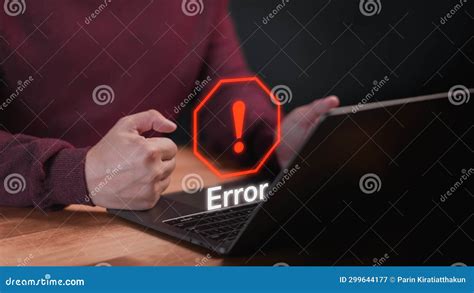 User Man Using A Computer Laptop With Caution Warning Sign For Notification Error Stock Image