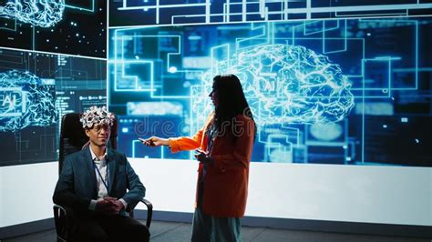 Neuroscientist Doing Demonstration At Ai Convention Using Eeg Headset Stock Image Image Of