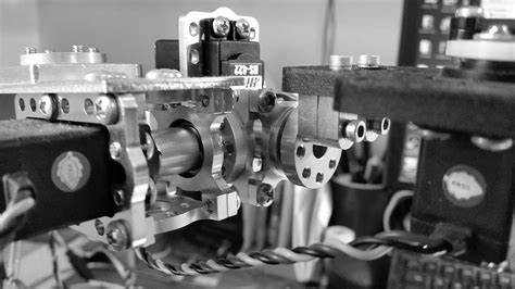 Homemade Robotic Arm Using Standard Parts Using Arduino And A