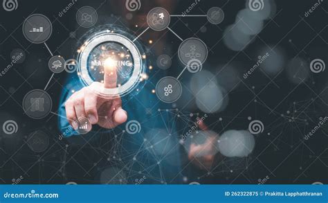 Businessman Pointing At An Iconmarketing Strategy Ideas Stock Image