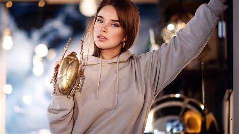 Beautiful Girl Model Luba Ivanova Is Standing In Blur Bokeh Background