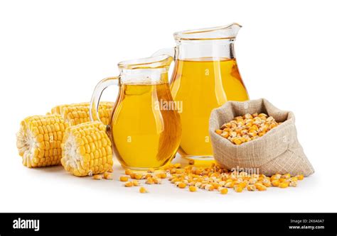 Corn Oil In A Bottle Corn Seeds In A Bag And Broken Corn Cobs Isolated