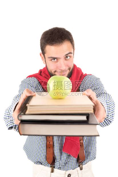 年轻书呆子学生装扮书籍和苹果在白色高清图片下载 正版图片502523471 摄图网