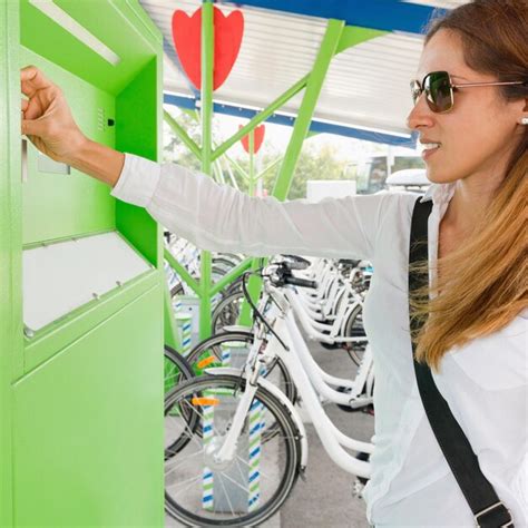 Premium Photo Young Woman Using Bicycle Sharing System