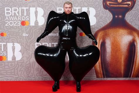 Sam Smith Sports Dynamic Harri Outfit On 2023 Brit Awards Red Carpet