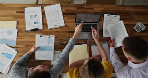 Hardworking Colleagues Team Review Information On Laptop Stock Footage