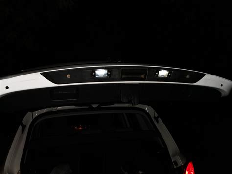 Замена ламп подсветки номера (светодиоды). (Tiguan 1G) — Volkswagen ...