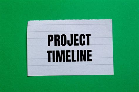 Premium Photo Project Timeline Message Written On Ripped Torn Paper Piece With Green
