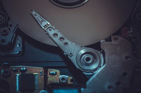 Premium Photo Pc Mechanism Inside Hard Disk With Fiber Optic Lights