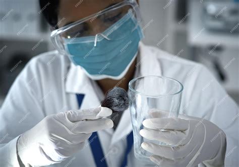 Premium Photo Forensics Scientist And Woman With Brush In Lab For Fingerprint Analysis Or