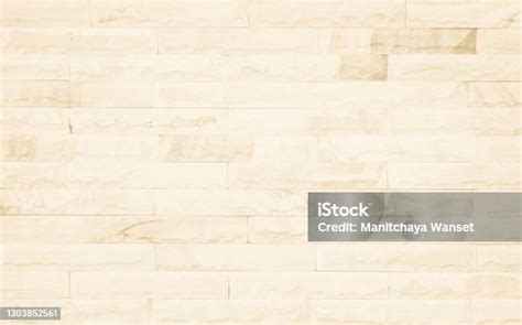 넓은 크림 벽돌 벽 질감의 빈 배경 베이지 색 오래된 갈색 벽돌 벽 콘크리트 또는 돌 질감 벽지 석회암 추상 바닥 그리드 고르지 않은 내부 바위 홈 장식 디자인 배경 0명에