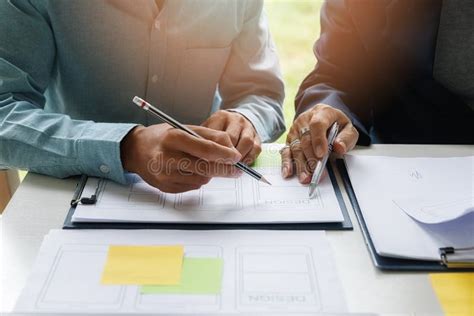 Ux Or Ui Designers Designing On Their Smartphone Application Layout Prototype Project Stock