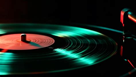Abstract Pattern Of Multi Colored Disk Spinning On Turntable Foreground