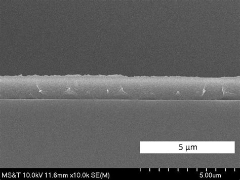 The Sem Image Of A Cross Section Of Pmma Thin Film Spin Coated On A Si Download Scientific