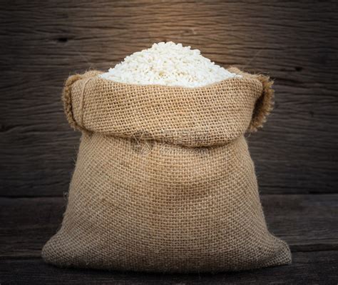 以木制背景的布麻袋为米高清图片下载 正版图片303553721 摄图网