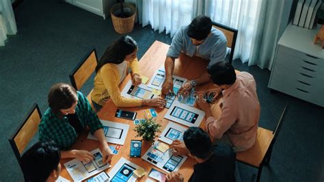 Top View Of Developer Team Designing Ux Ui Design For Mobile Phone Convocation Stock Image