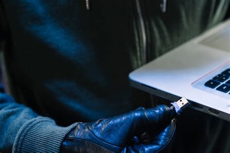 Free Photo Close Up Of Hacker With Usb Stick