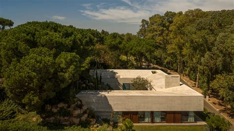 Ooda Digs Concrete Oeiras House In Portugal Into A Sloping Site