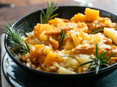 Risotto With Winter Squash Vegan Protein And Pineapple By Stocksy Contributor Harald Walker