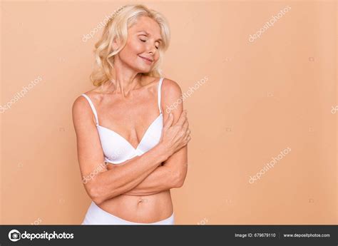 Photo Dreaming Teasing Mature Age Woman Cuddles Her Shoulders Underwear