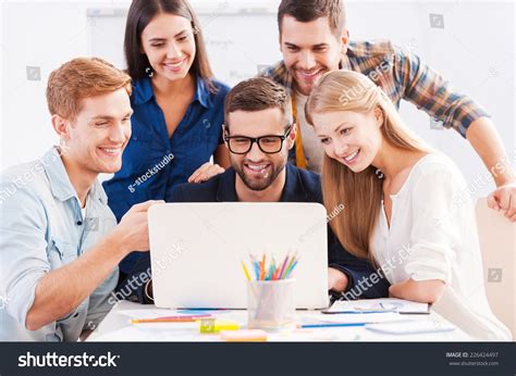 Group Looking At Computer Over 78901 Royalty Free Licensable Stock