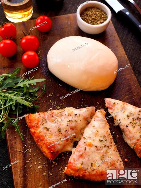 Slices Of Pizza Margherita With Rocket Salad Small Tomatoes Oregano
