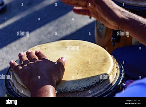 Drum Player Playing Atabaque During Presentation Of Afro Music On The
