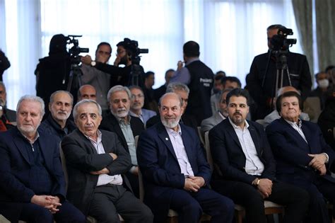 دیدار ابراهیم رئیسی و عباس قادری در حاشیه یک مراسم عکس