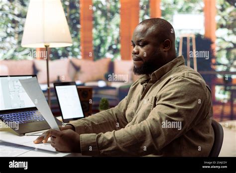 Professional Entrepreneur Planning An Office Relocation At Home Office
