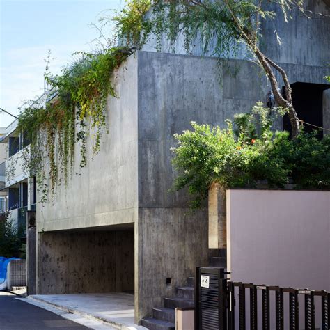 node cantilevered wooden house by uid architects
