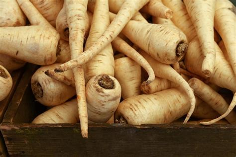 Premium Photo Parsnip Roots In Wooden Box