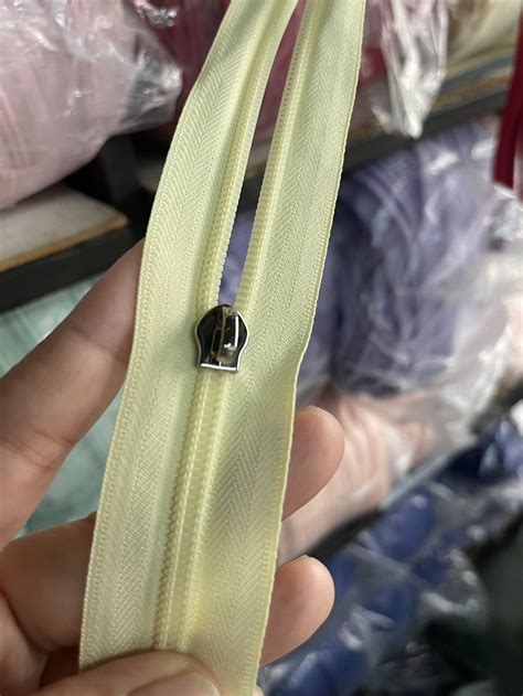 Nylonซิปตัดไนล่อน เบอร์5 ซิปตัด1หลา พร้อมหัวซิปไนล่อนสีเงิน 2หัว Shopee Thailand