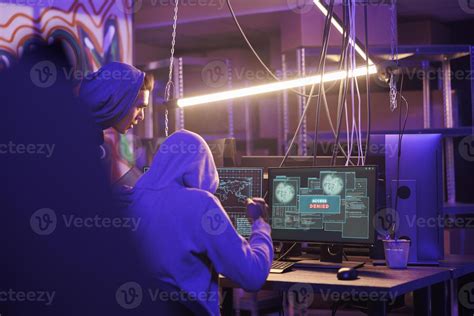 Hackers Getting Access Denied Message On Computer Screen While Hacking Server Two Criminals In