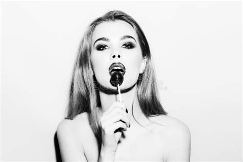 Passionate Blonde Young Woman Portrait With Sugar Candy Stock Image