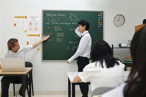 Premium Photo Explaining Pythagorean Theorem On Chalkboard In Classroom