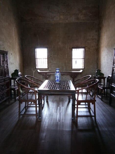 Premium Photo Tables And Chairs In Building