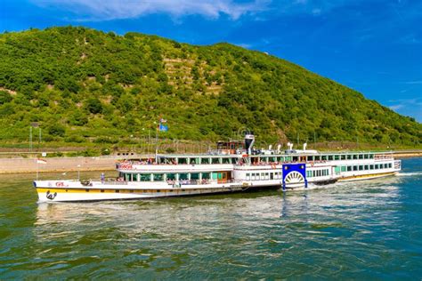 Touristic Cruise Passenger Motor Ship Boat And Vineyards In Ruedesheim