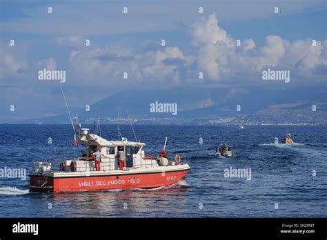 A Dive Team From The Italian Fire And Rescue Service Heads Out To The Site Of The Bayesian On