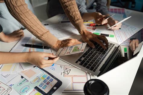 creative ux ui design process with team collaborating on mobile app