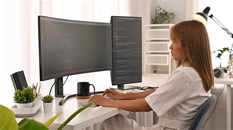 Focused Female Software Dev Works With Code In Modern Office Photo Background And Picture For