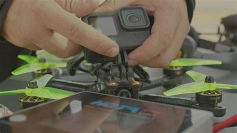 Man Assembling A Camera To A Drone Free Stock Video