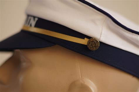 Синя Капитанска шапка Веникс производител на дрехи и тениски с шевици ризи с български