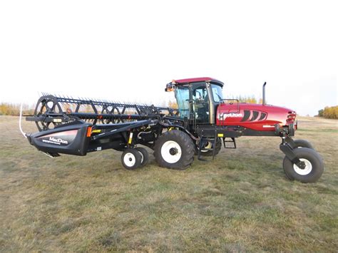 Dunkle Auction Services 2013 Macdon M155 S P Swather W Macdon D65 D 35 Ft Split P U Reel