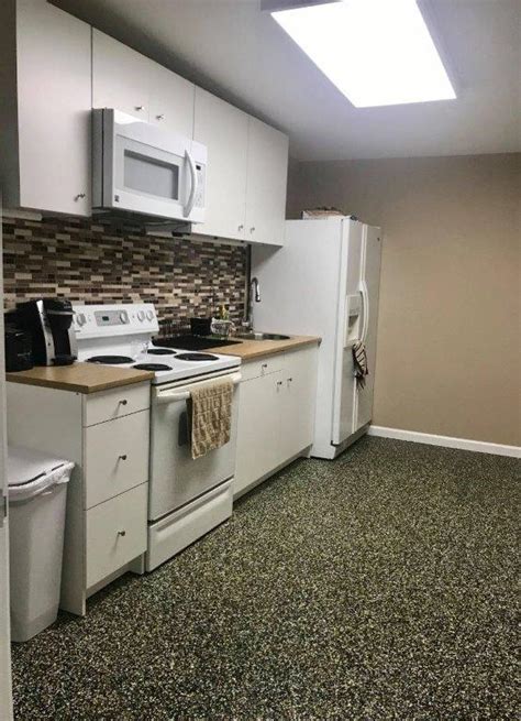 Black And Yellow Epoxy Flake Floor The Epoxy Floor Company